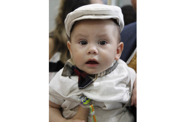 "Efraín Romo Serrano celebra su bautismo"